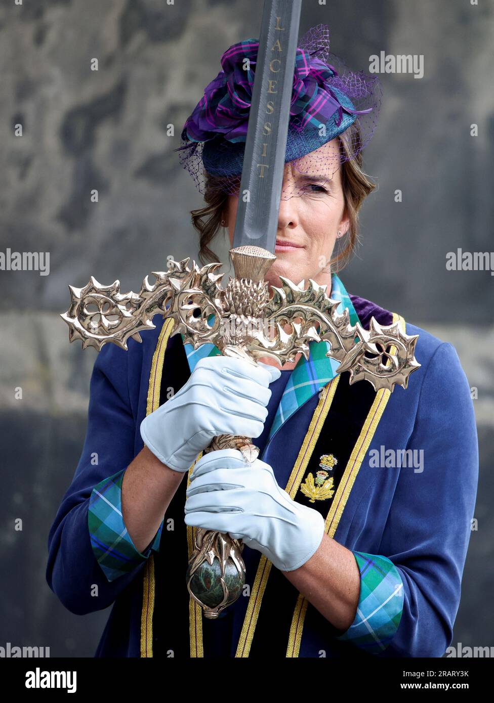Dame Katherine Grainger carries The Elizabeth Sword, which forms part ...
