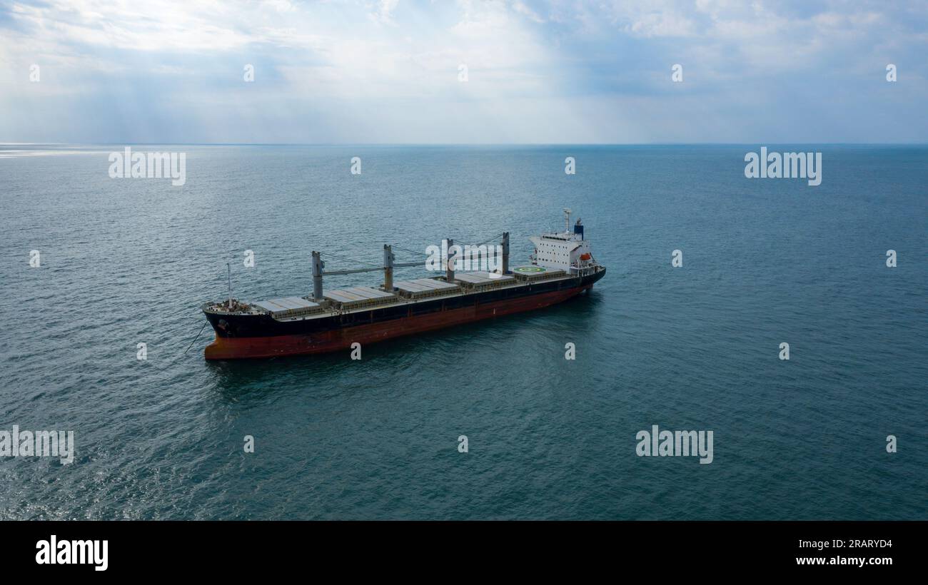 Self-unloading bulk carrier at Rio De La Plata anchorage. Aerial front ...