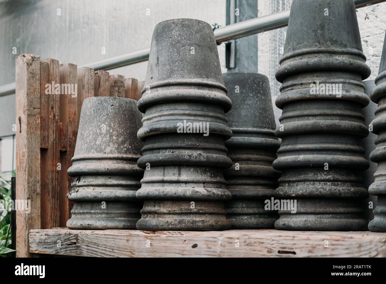 Empty decorative burnt ceramic flower pots for sale on the shelves at ...