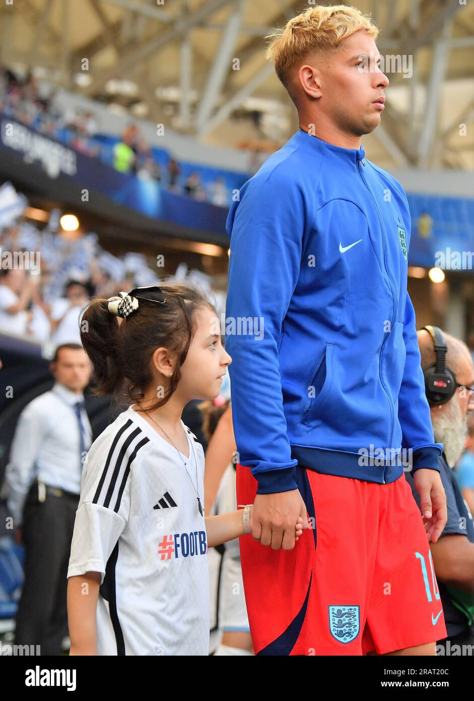 Emile Smith Rowe of England walks out with a mascot beforeduring the ...