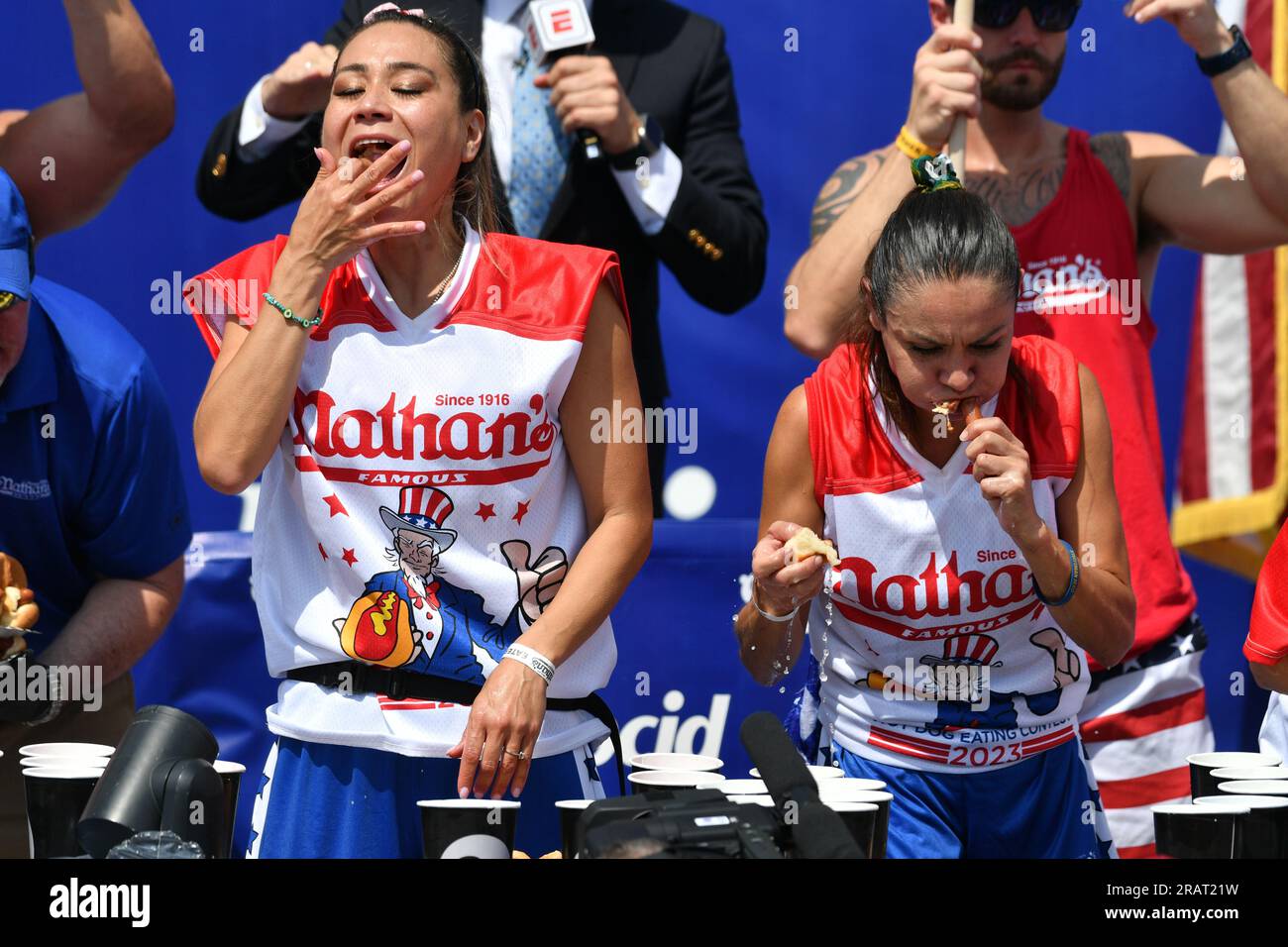 Professional competitive eater Miki Sudo and Michelle Lesco compete in ...