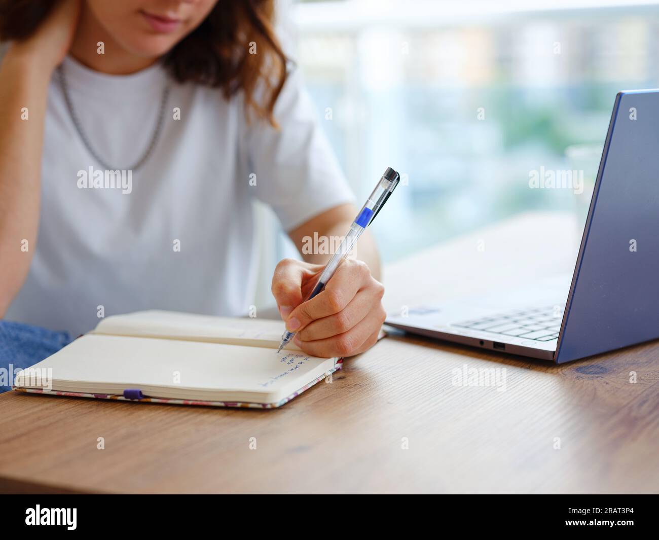 Young spanish worker writing hi-res stock photography and images - Alamy
