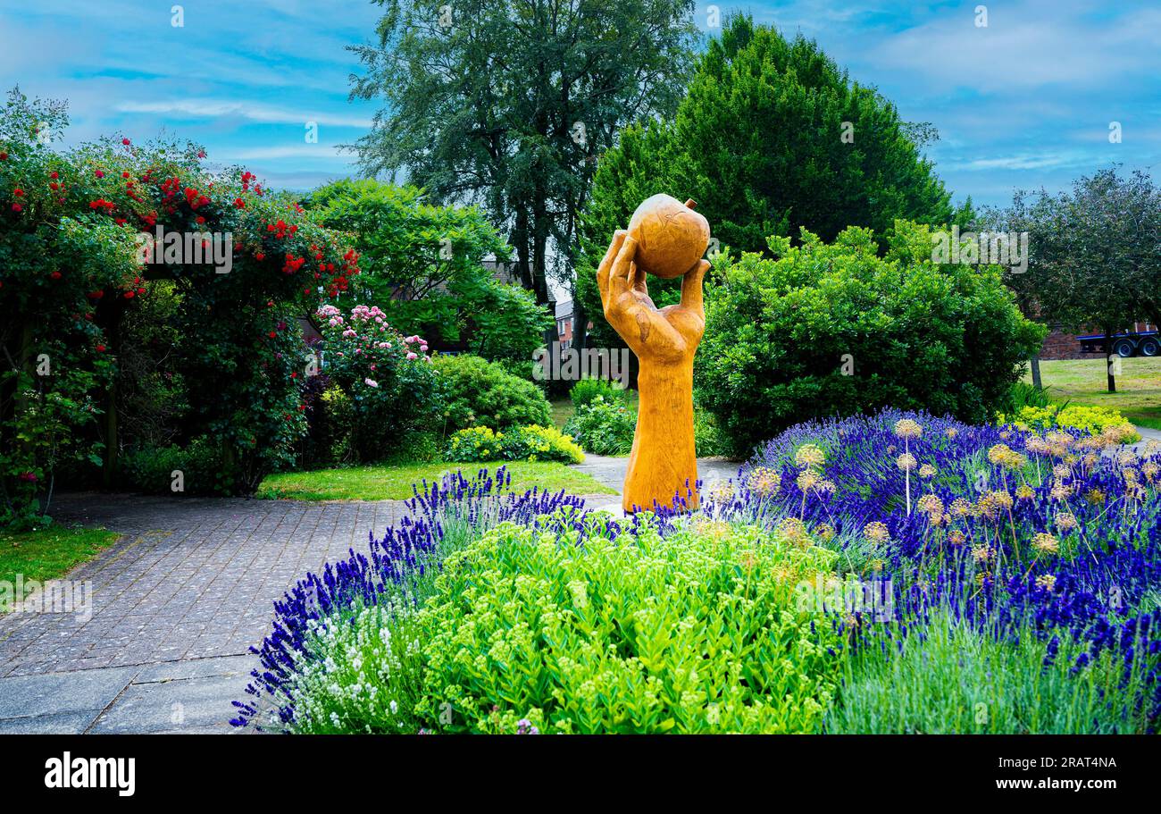 Wyndham Park, Grantham, Lincolnshire, UK. A wood hard carved sculpture ...