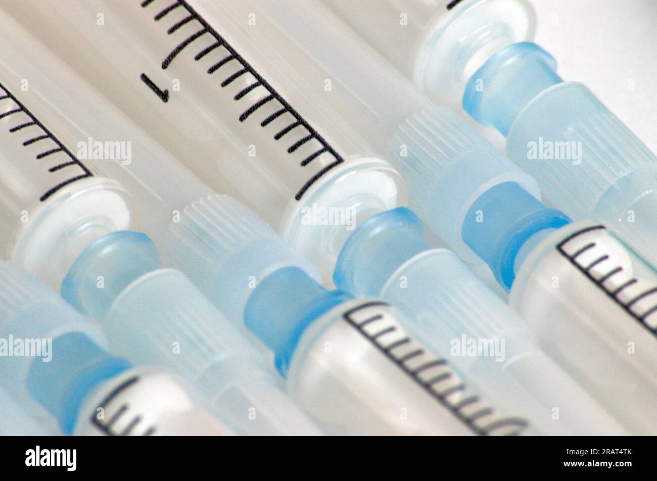 syringes with needle on white background Stock Photo - Alamy
