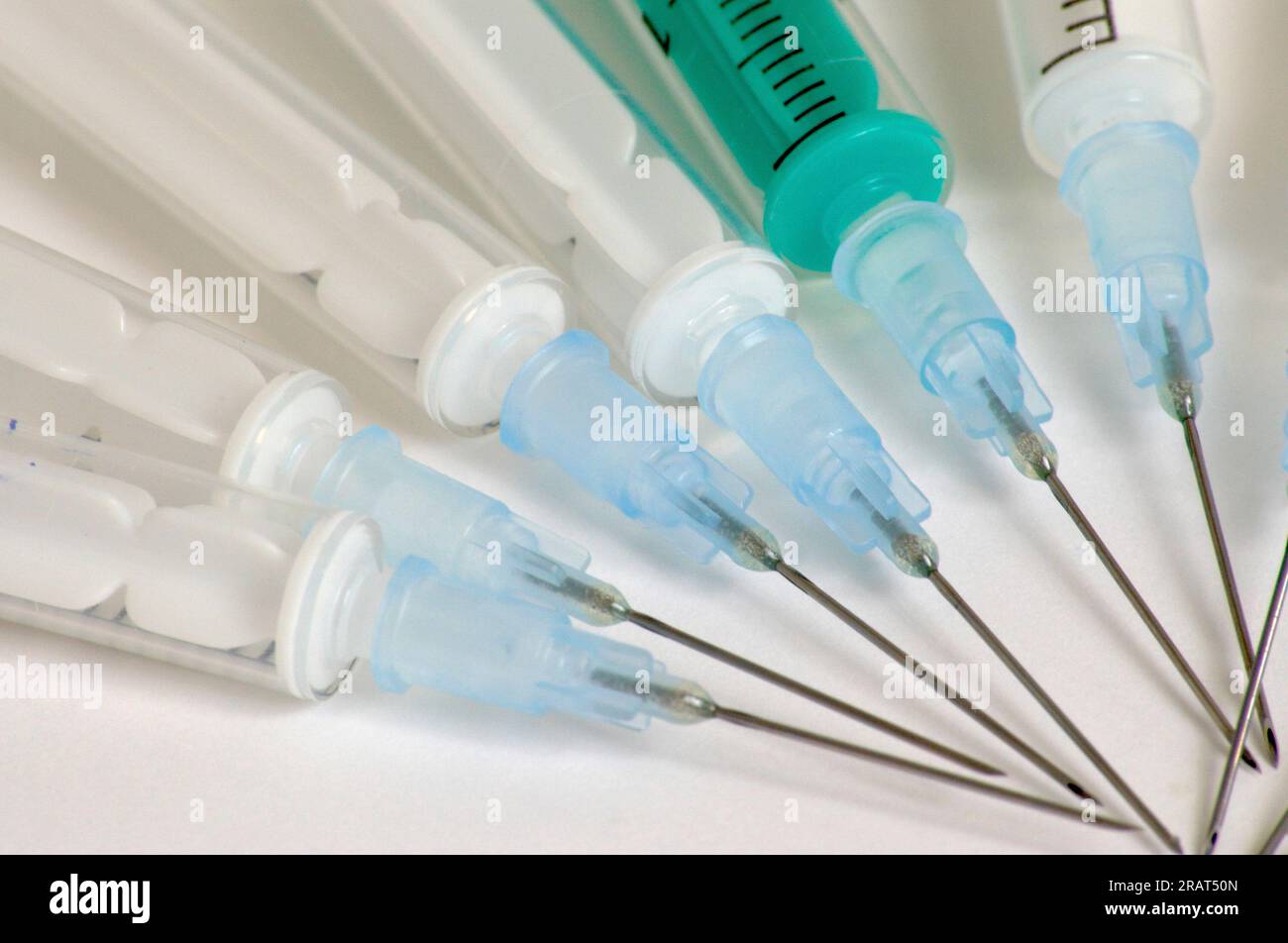 syringes with needle on white background Stock Photo - Alamy