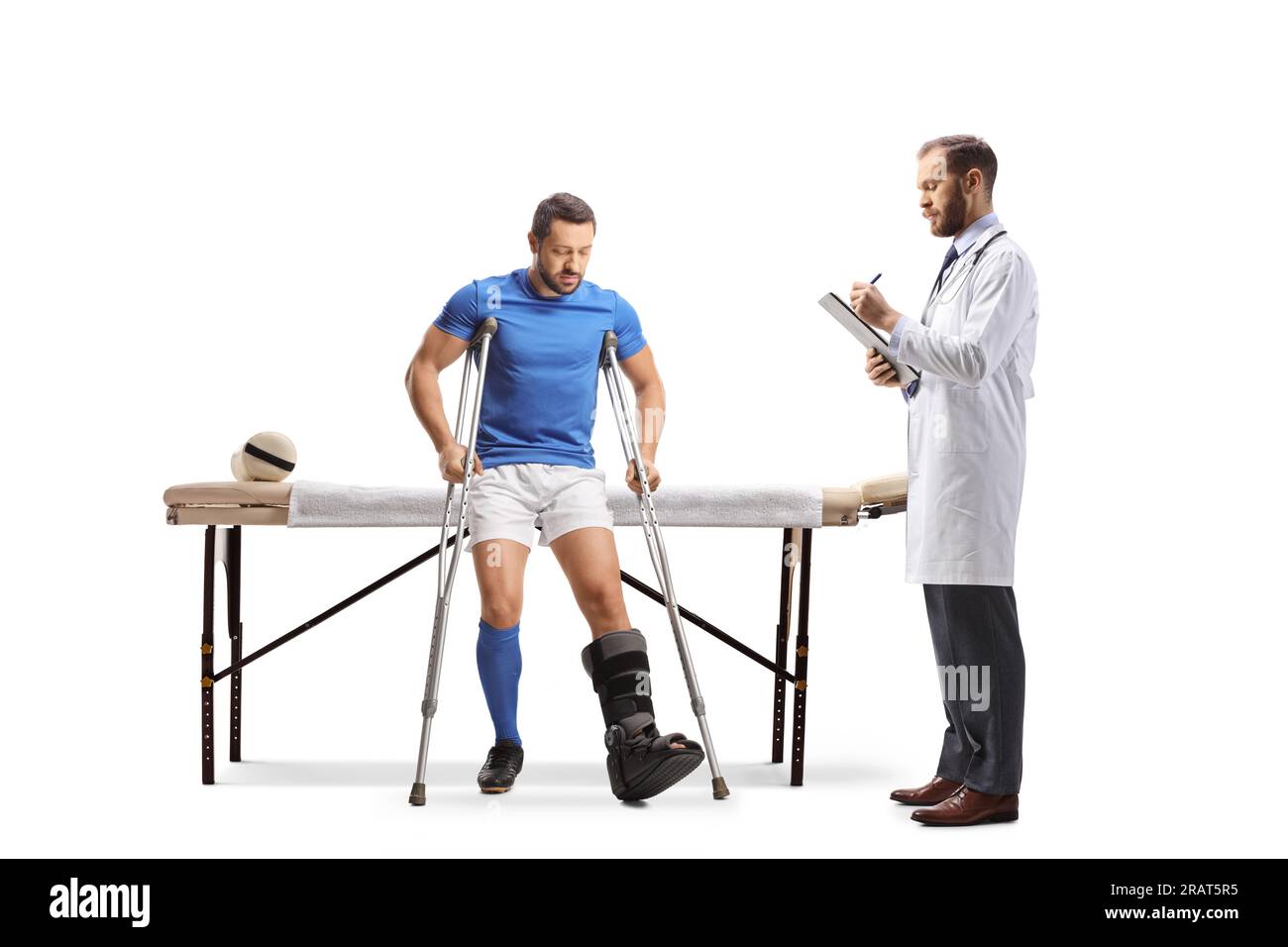 Football player with injuries practicing a physical therapy and walking ...