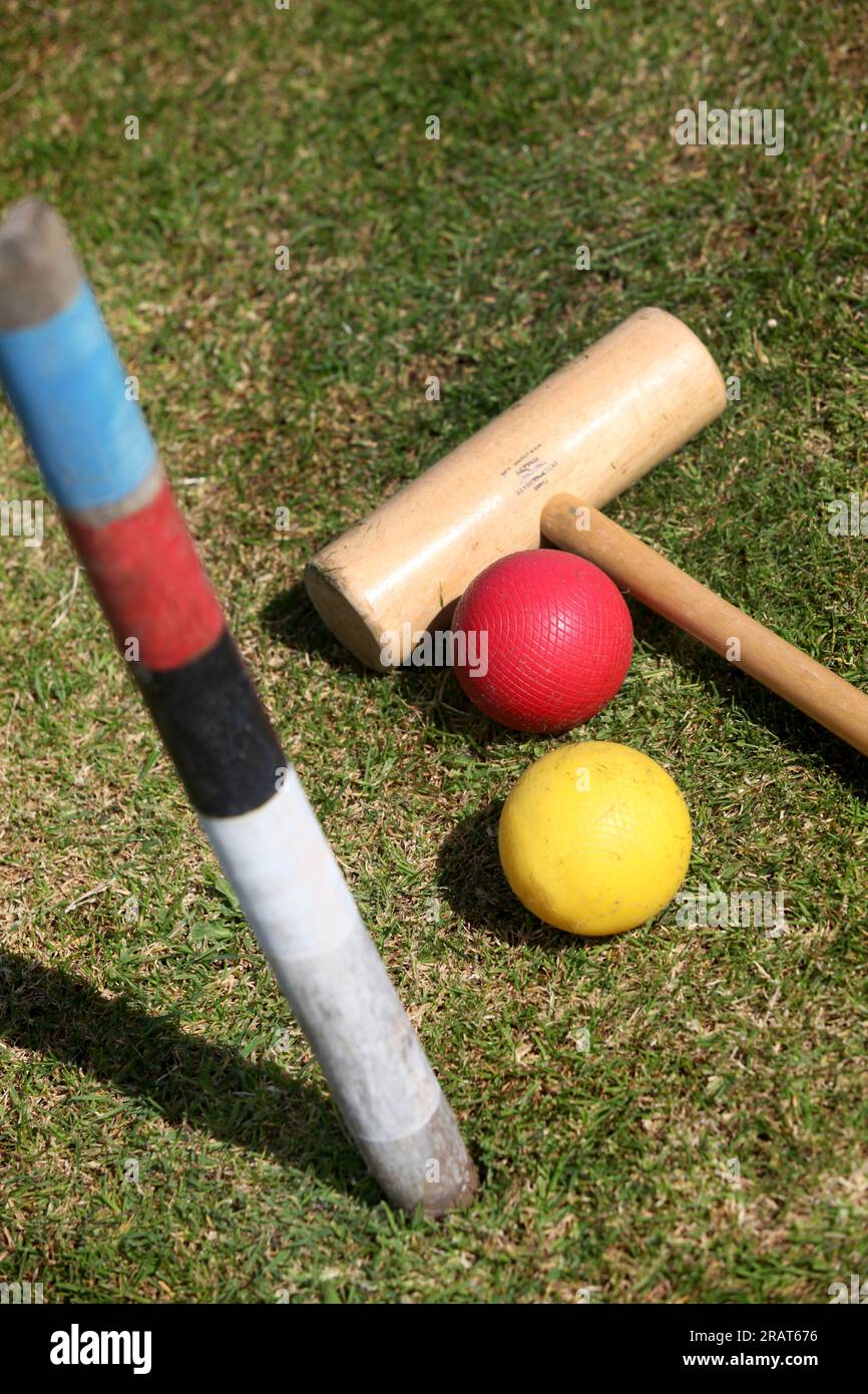 A croquet mallet, coloured peg and pair of balls Stock Photo - Alamy