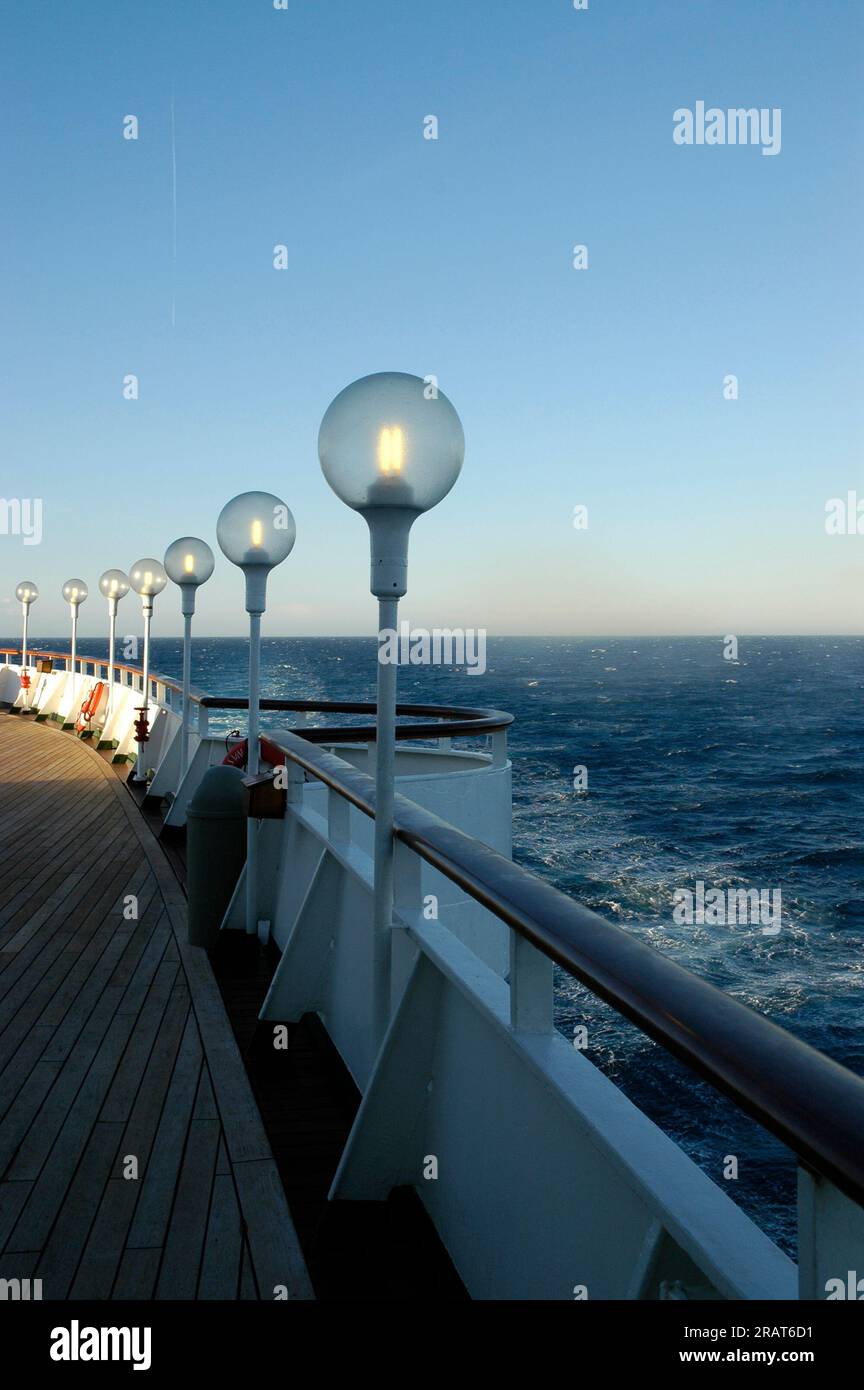 lighted lanterns on the deck of a cruise ship overlooking the sea Stock ...