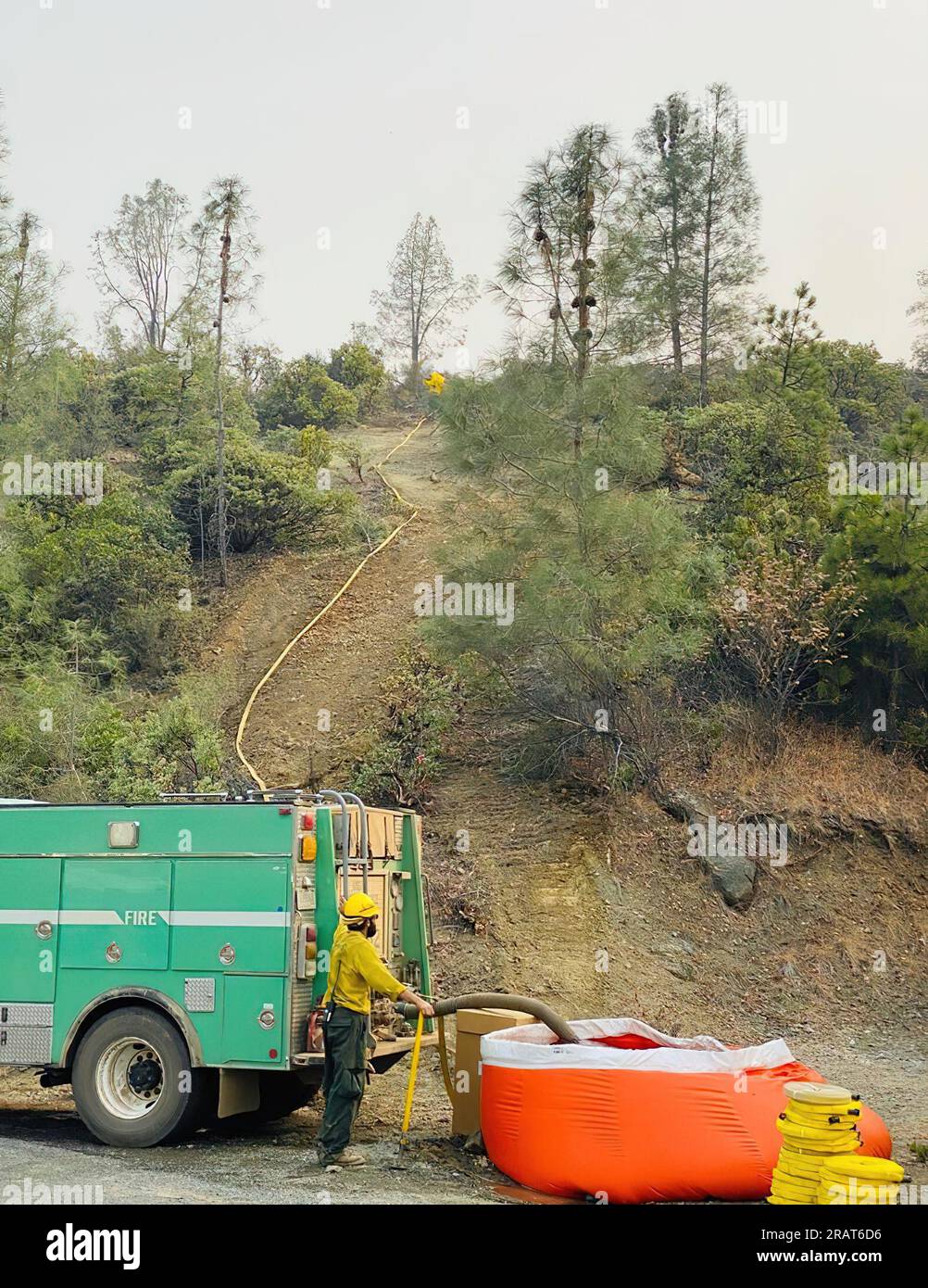 Every single foot of hose must be carried in & placed by hand to help ...