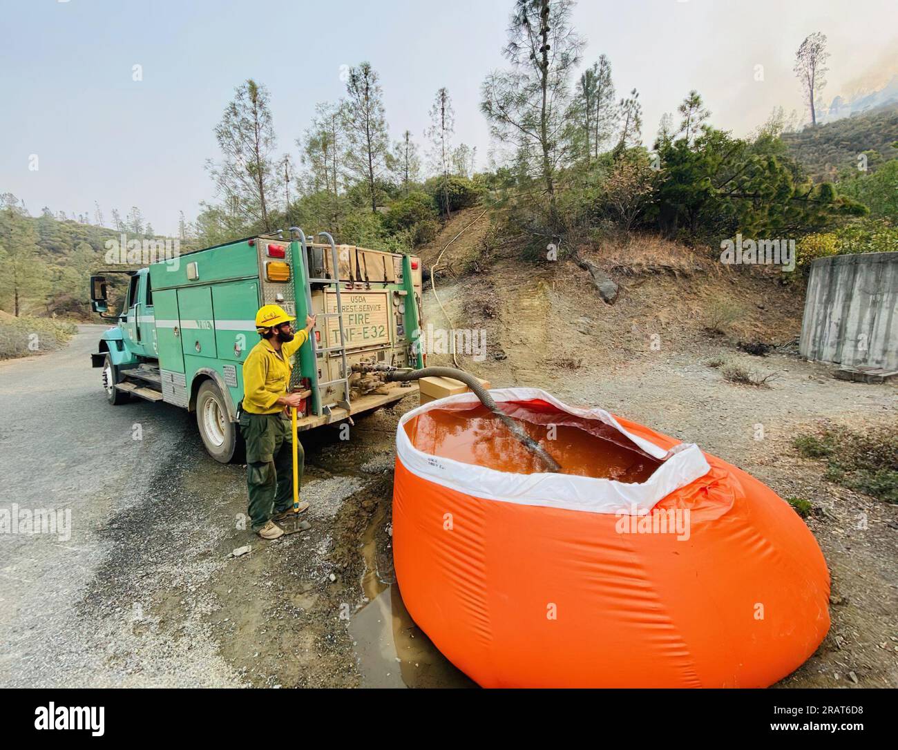 Every single foot of hose must be carried in & placed by hand to help ...