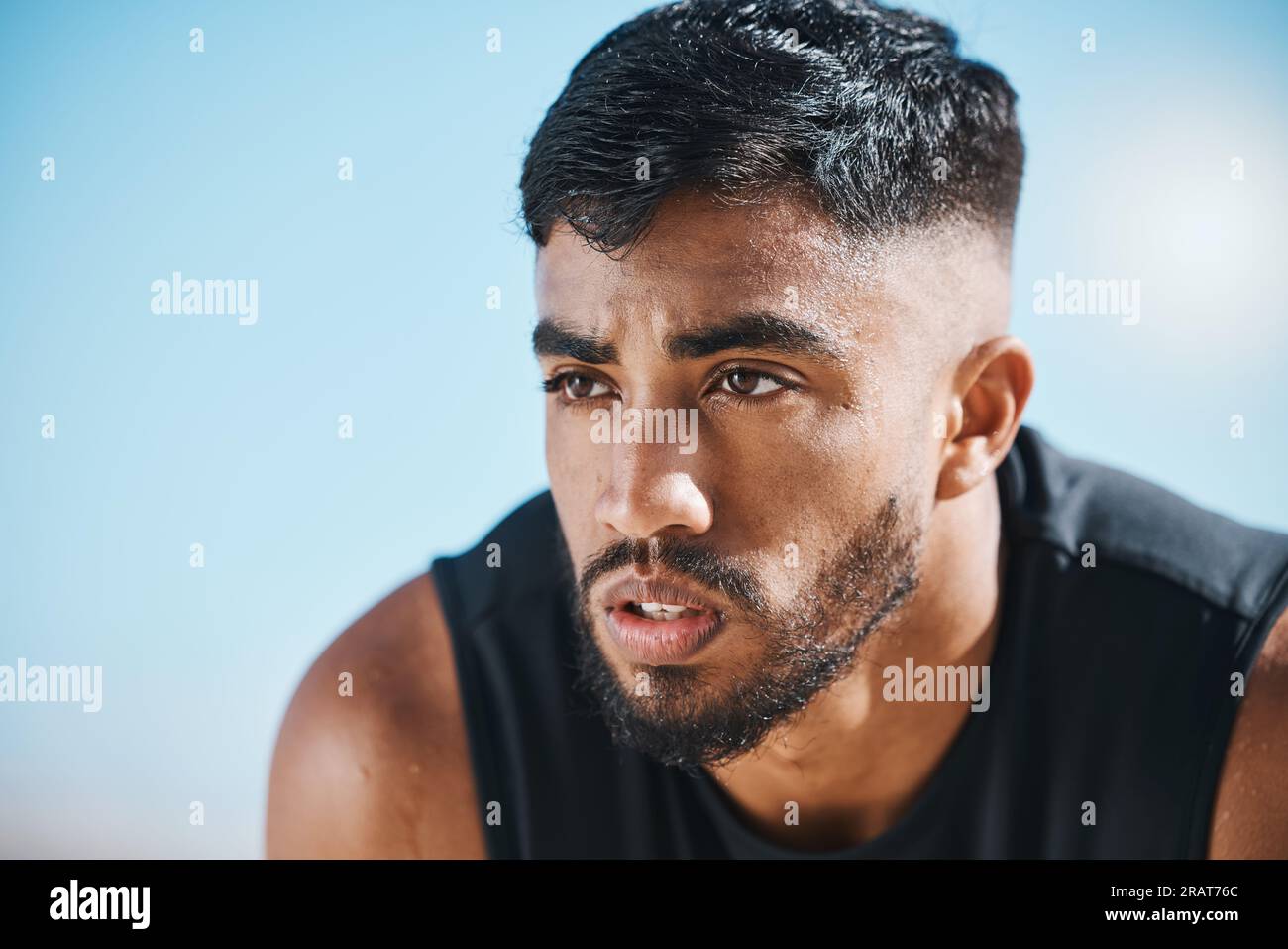 Fitness, break and tired man outdoor breathing, rest and relax after ...