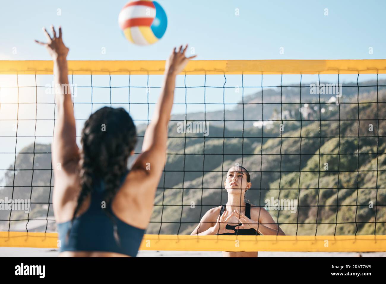 Volleyball, women and spike, net with sports and fitness outdoor ...