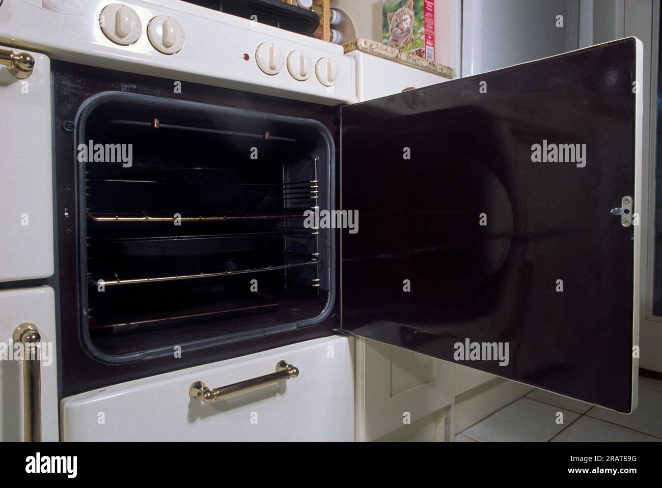 Open Stoves Gas Oven Door in Kitchen Stock Photo - Alamy