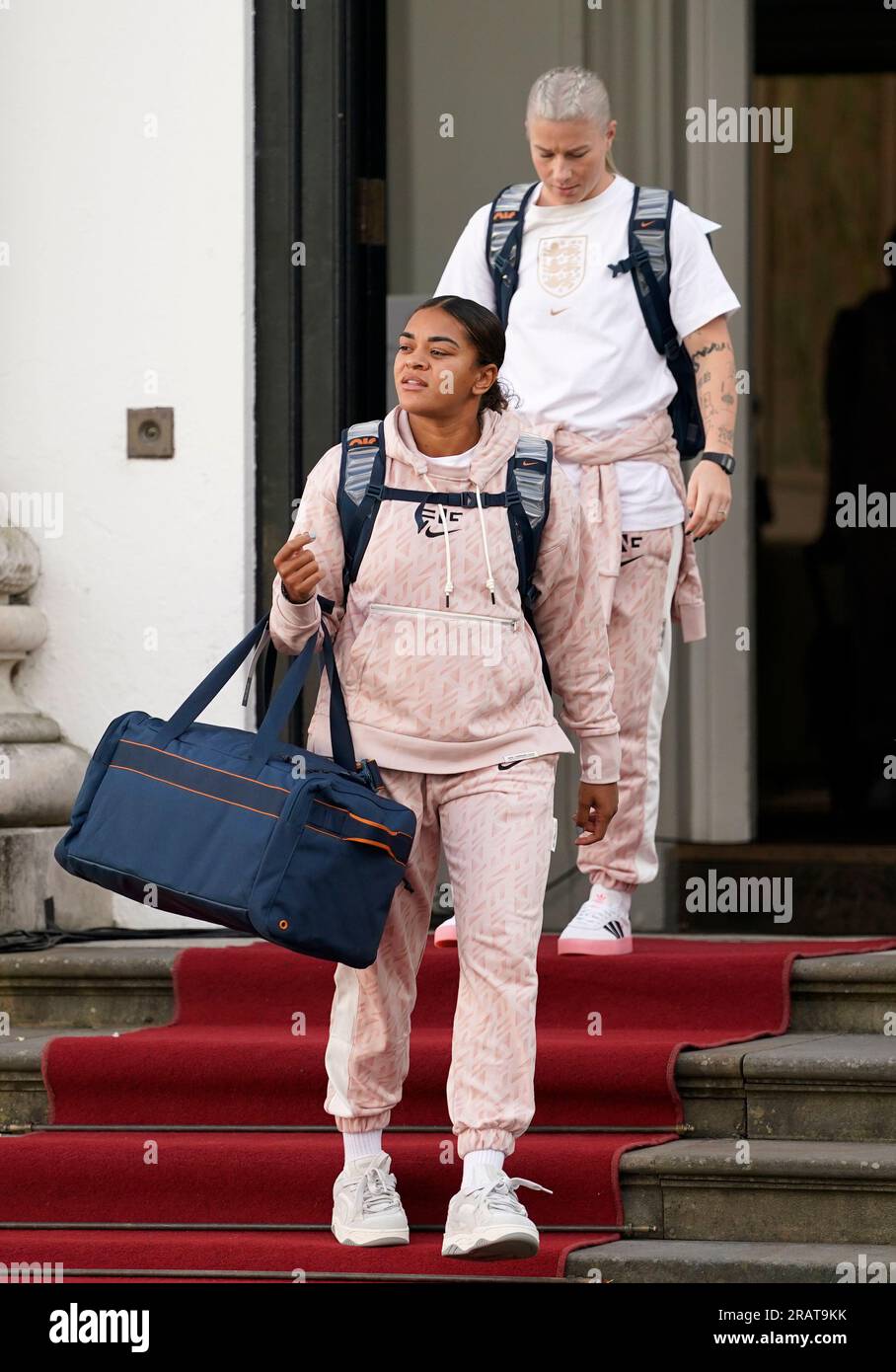 Jess Carter (front) and Beth England as the England team depart from ...