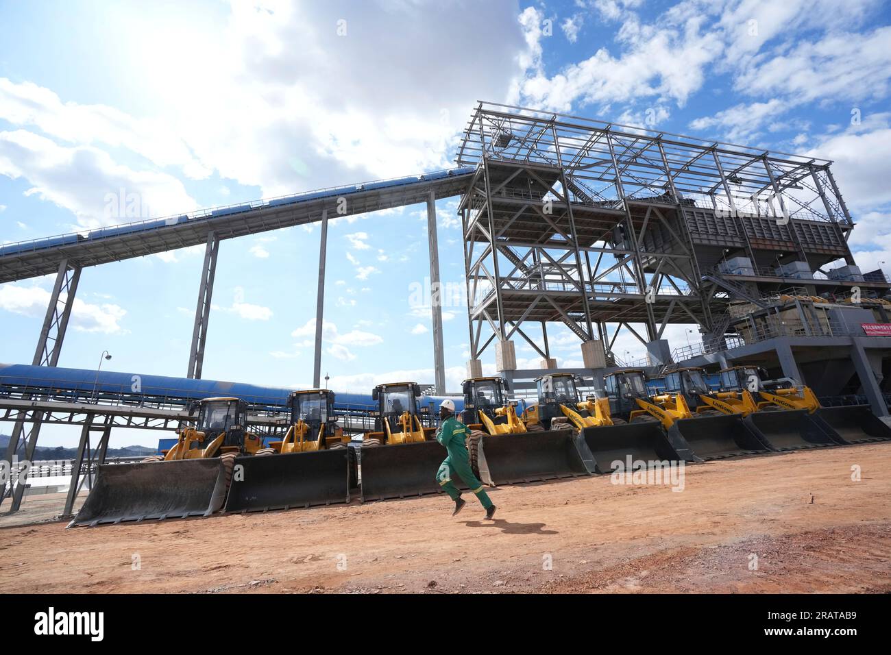 A worker is seen on the grounds of Prospect Lithium Zimbabwe's ...
