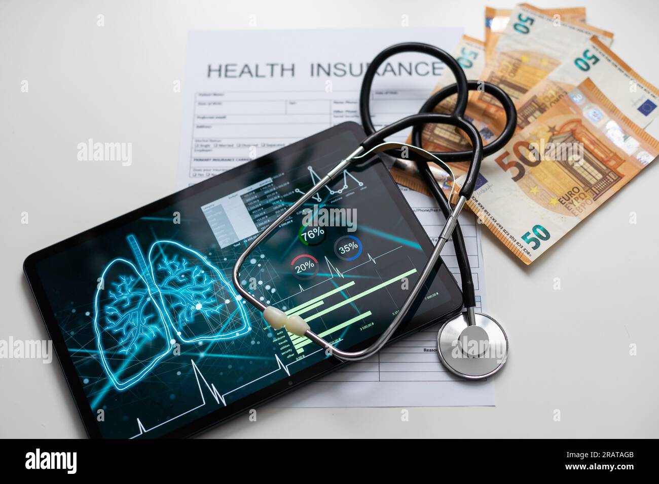 Modern social health insurance program. Tablet computer with healthcare ...