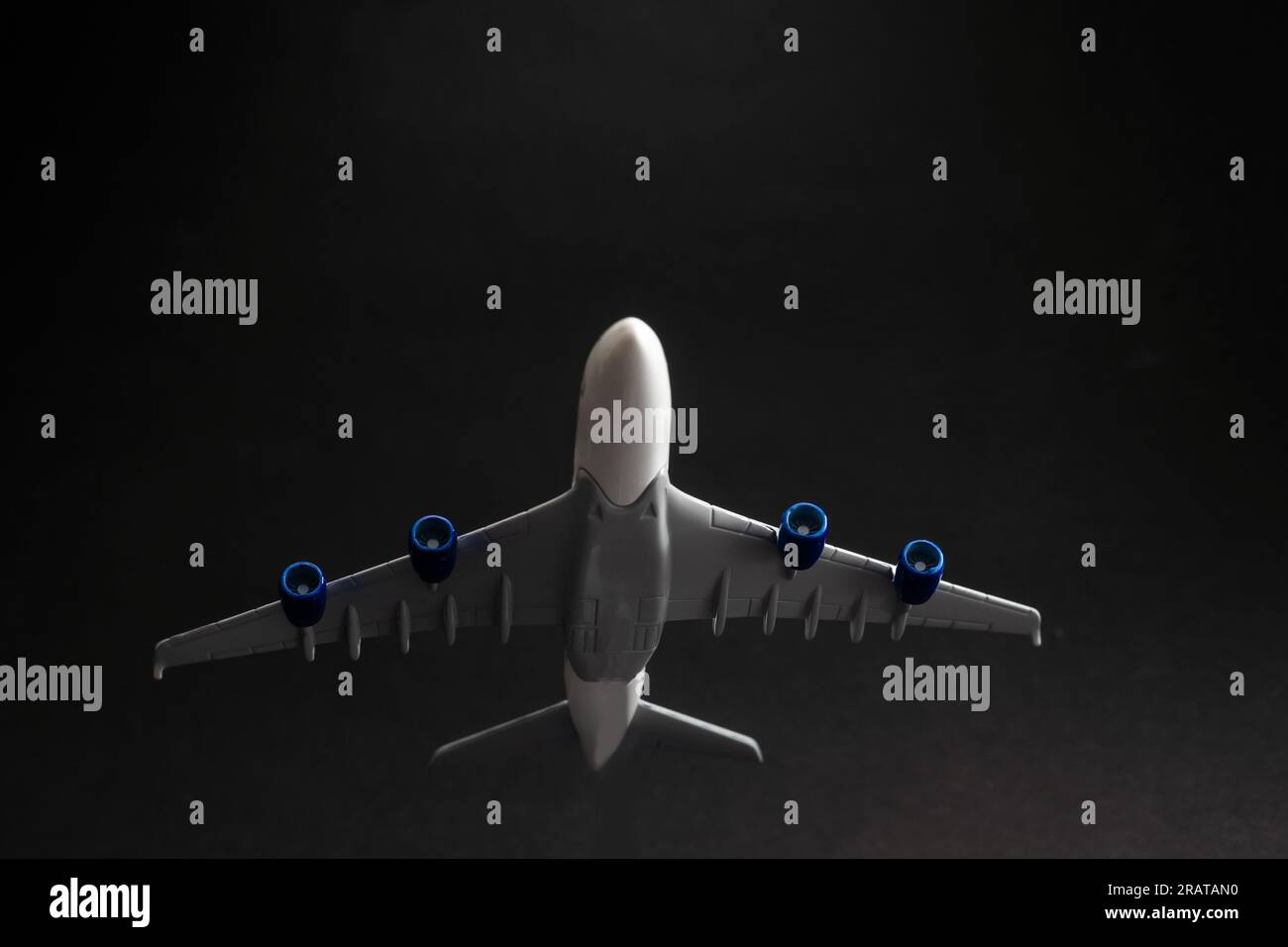 Model plane, airplane on dark background Stock Photo - Alamy