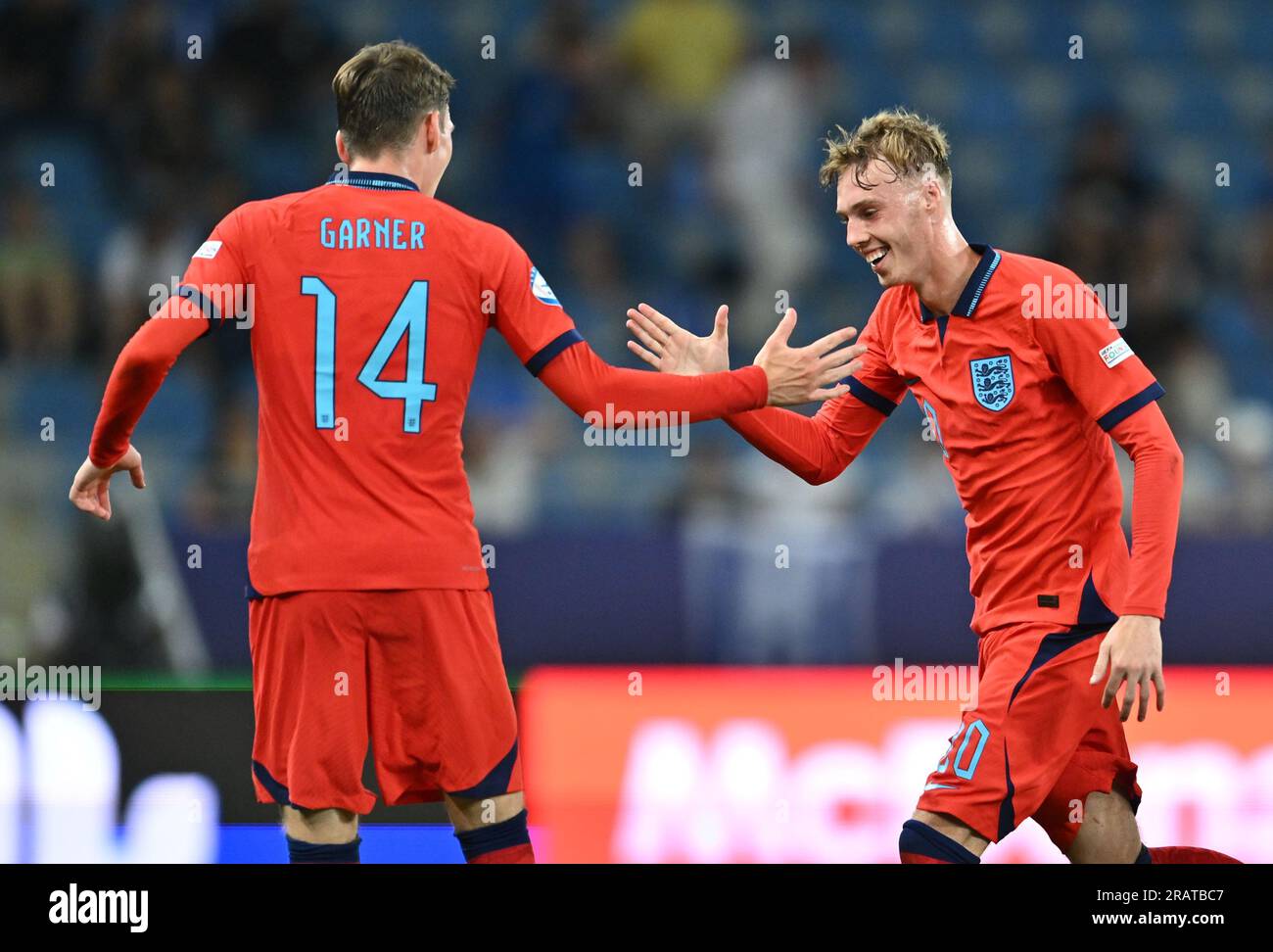 Cole Palmer of England celebrates with James Garner after VAR awards ...