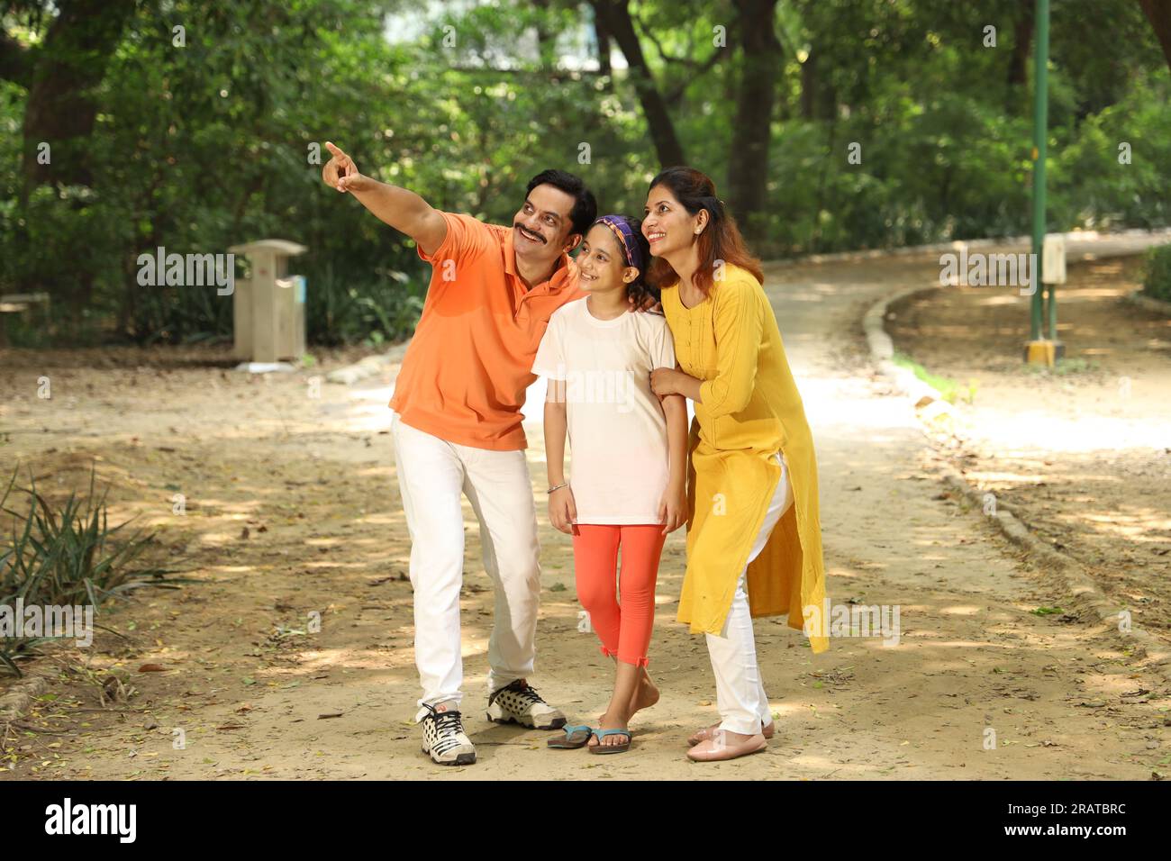Happy Indian family with a girl child playing together and enjoying ...