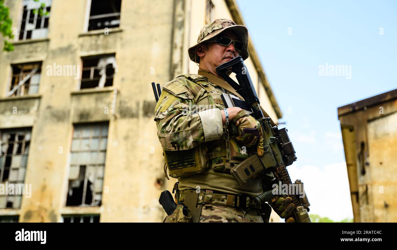 Expert team of soldiers attacking enemy during military operation, Army ...