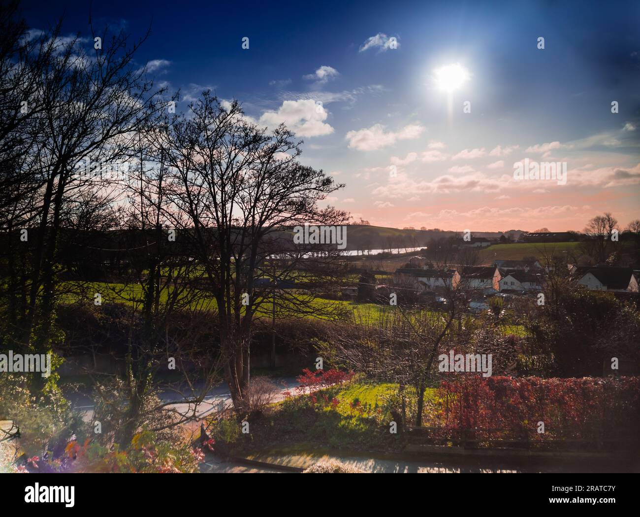 The Sun rising over the Otter Valley on a cold Winters day Stock Photo ...