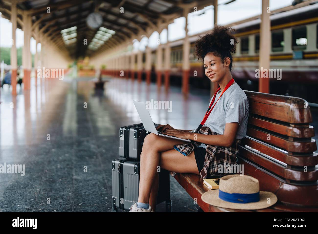 Asian teenage girl african american traveling using computer laptop ...