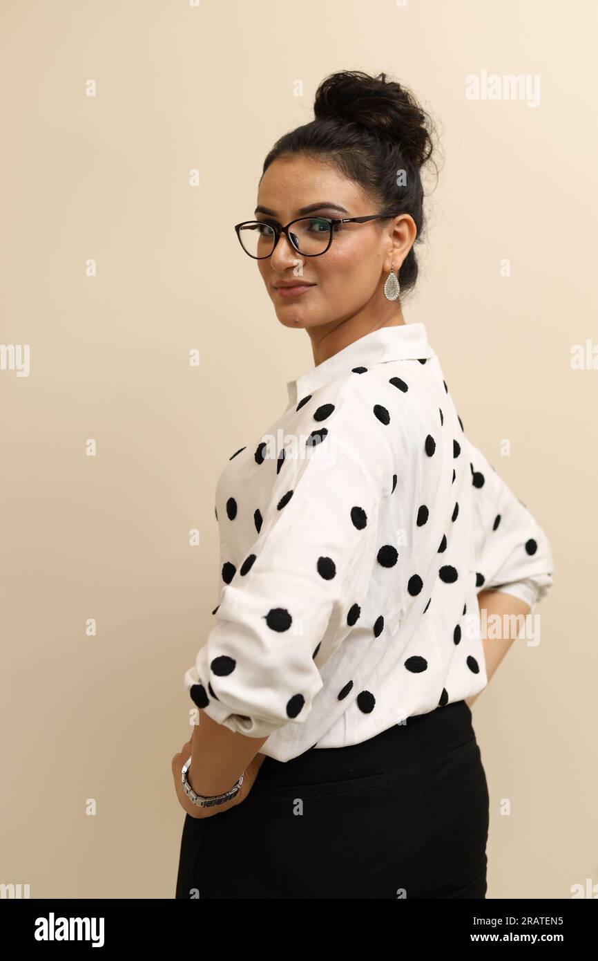 Corporate executive girl in office premise in a very professional ...