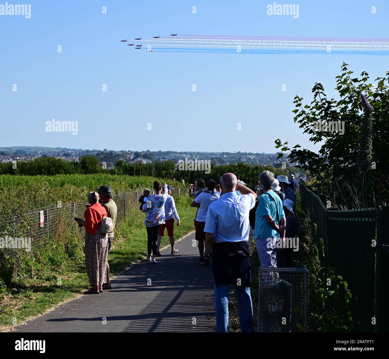 People watching the Red Arrows displaying over Torbay during the ...