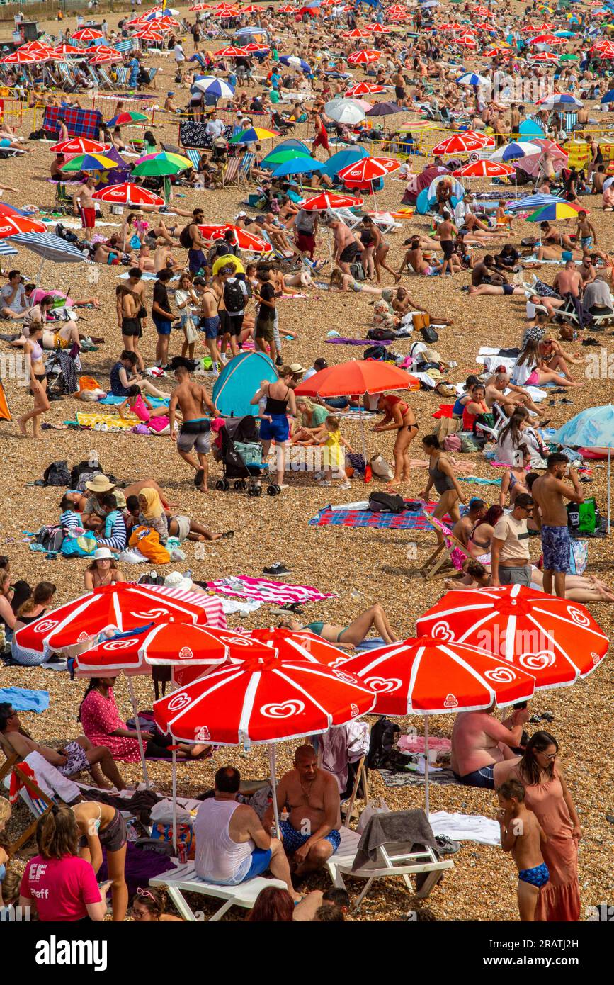 A very crowded beach on a hot summer's day in Brighton, East Sussex ...