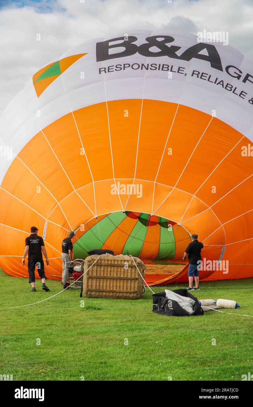 Members of the B&A Balloon Team inflating their Balloon with a fan ...