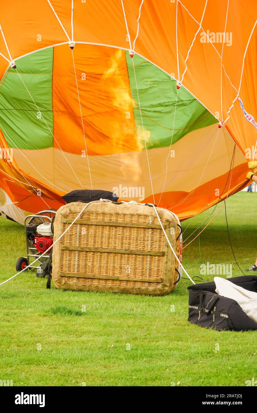 Hot air from a gas burner inflating the B&A Team Balloon Worcester ...