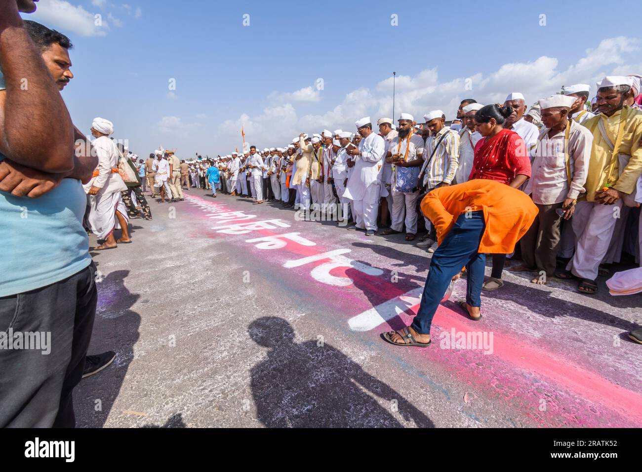 People gathering to appreciate the rangoli drawn to welcome palkhi ...