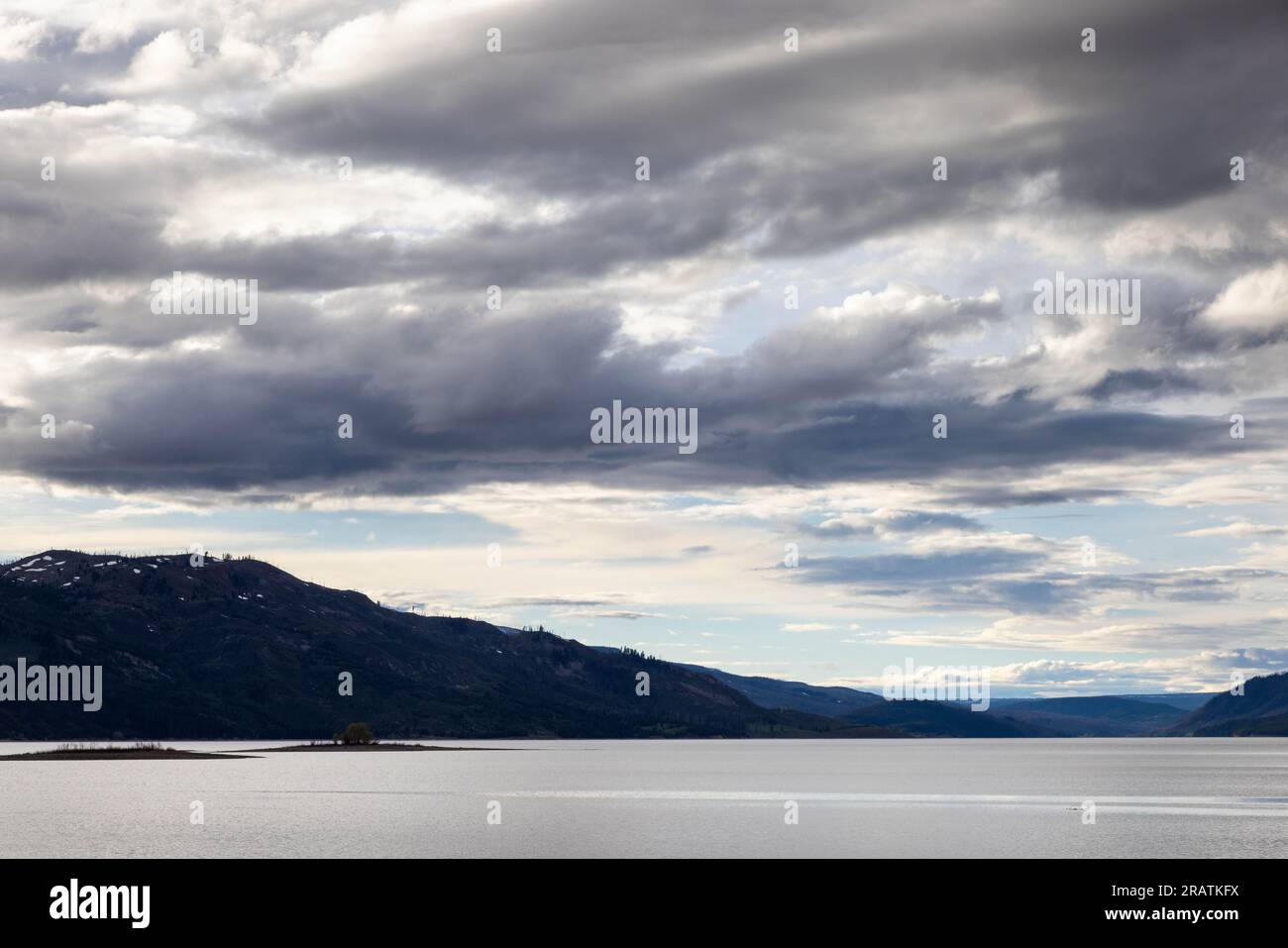 Passing storm clouds shifting over Jackson Lake from the Lakeshore Trail. Grand Teton National ...
