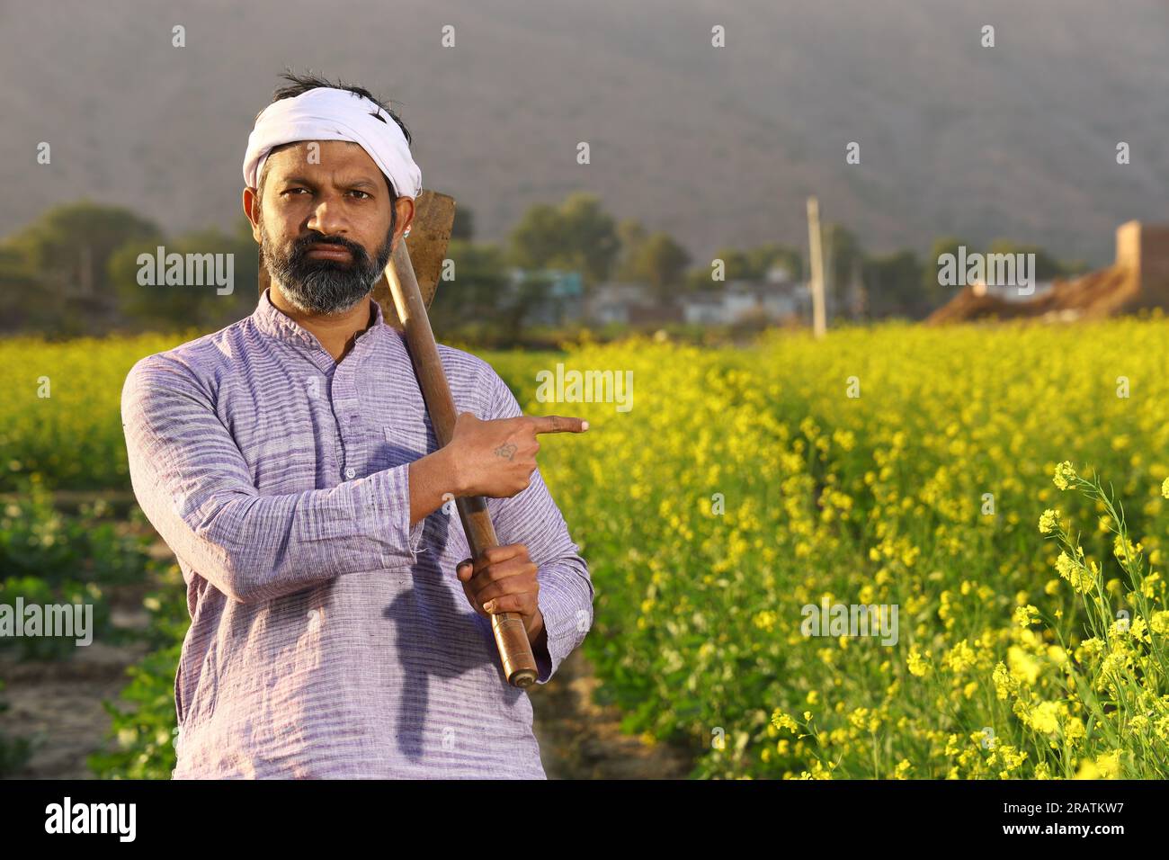Angry bearded farmer holding shovel in hand hi-res stock photography ...