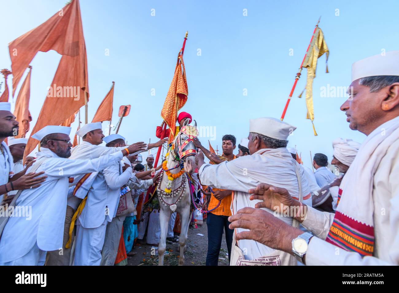 People taking blessings from the horse of god also called as dev ashwa ...