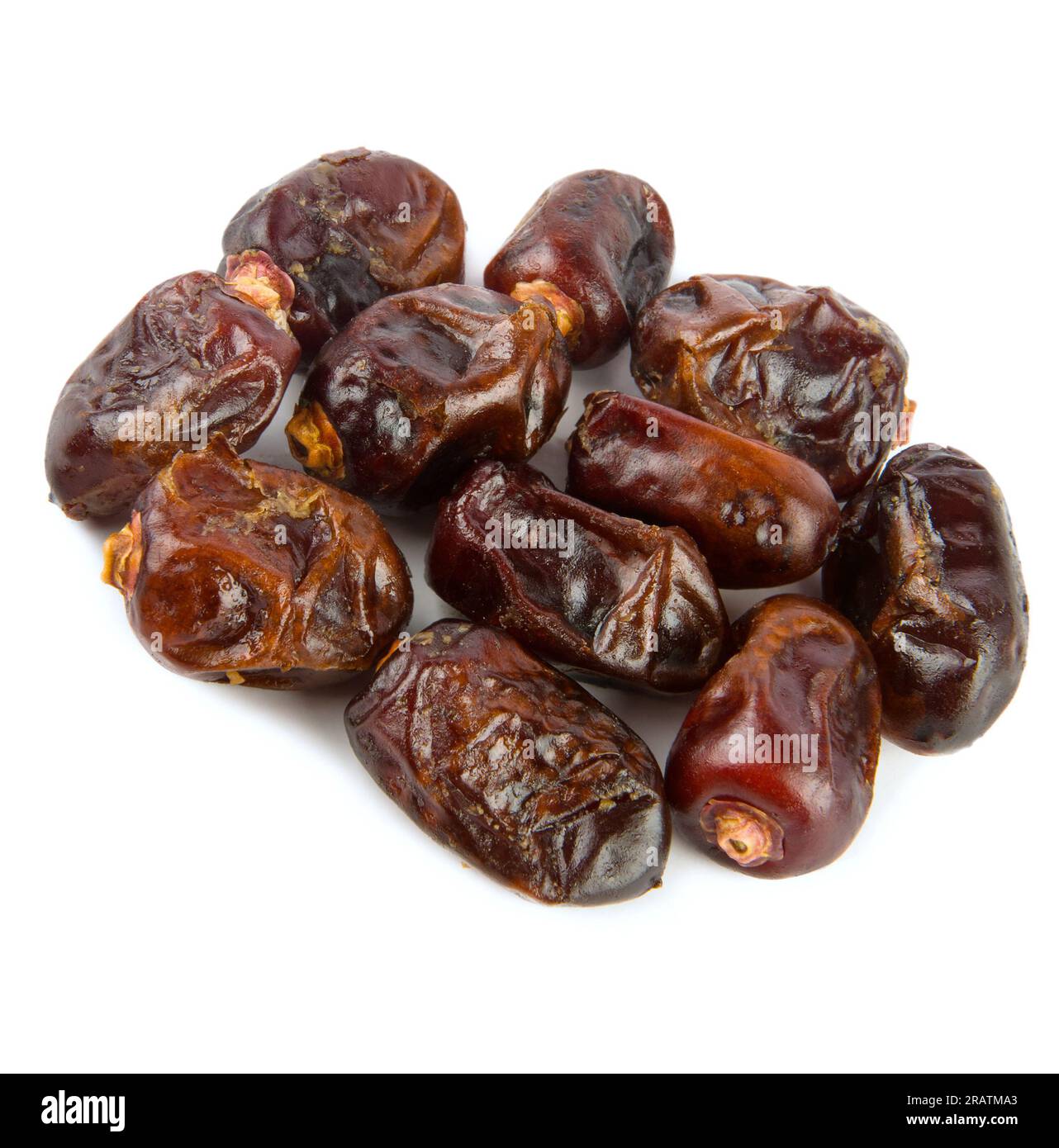 Dried dates isolated on white background Stock Photo - Alamy