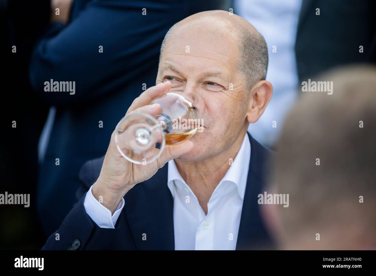 Berlin, Germany. 05th July, 2023. Chancellor Olaf Scholz (SPD) drinks ...