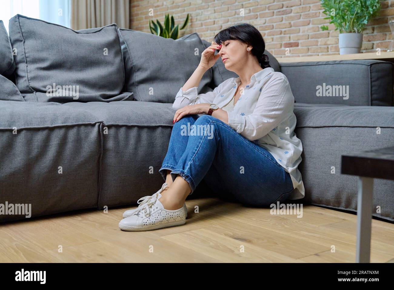 Mature woman suffering from physical pain, mental problems Stock Photo ...