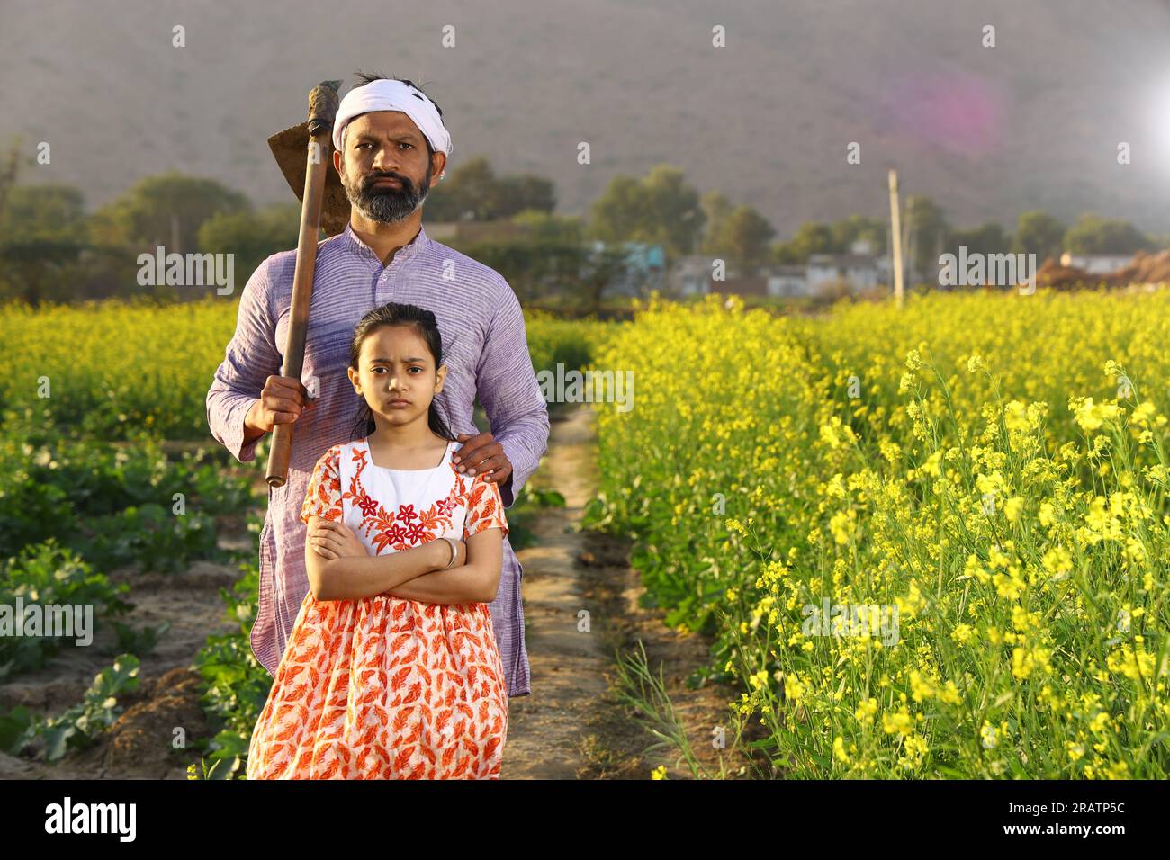 Beautiful dramatic portrait of Indian rural angry farmer and daughter ...