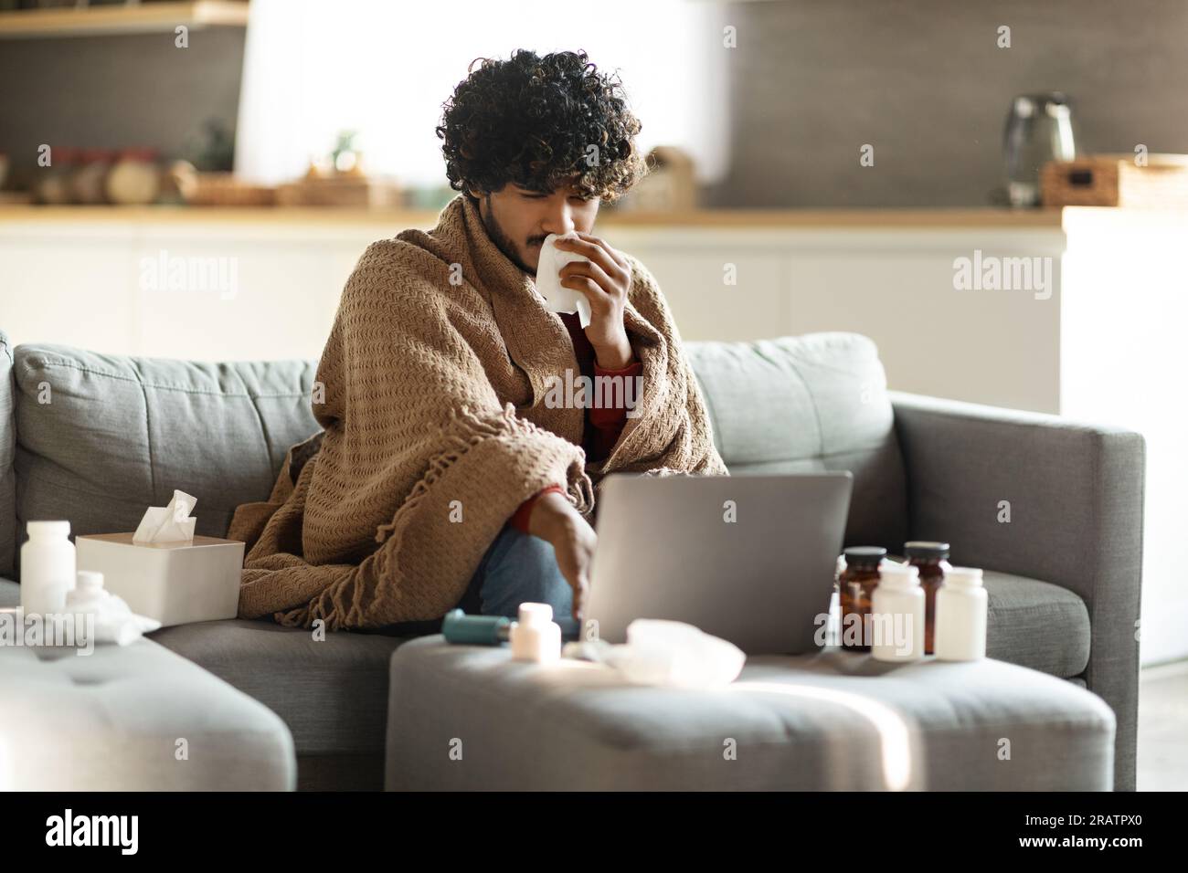 Sick Indian Man Sneezing Nose And Looking For Treatment Tips In ...