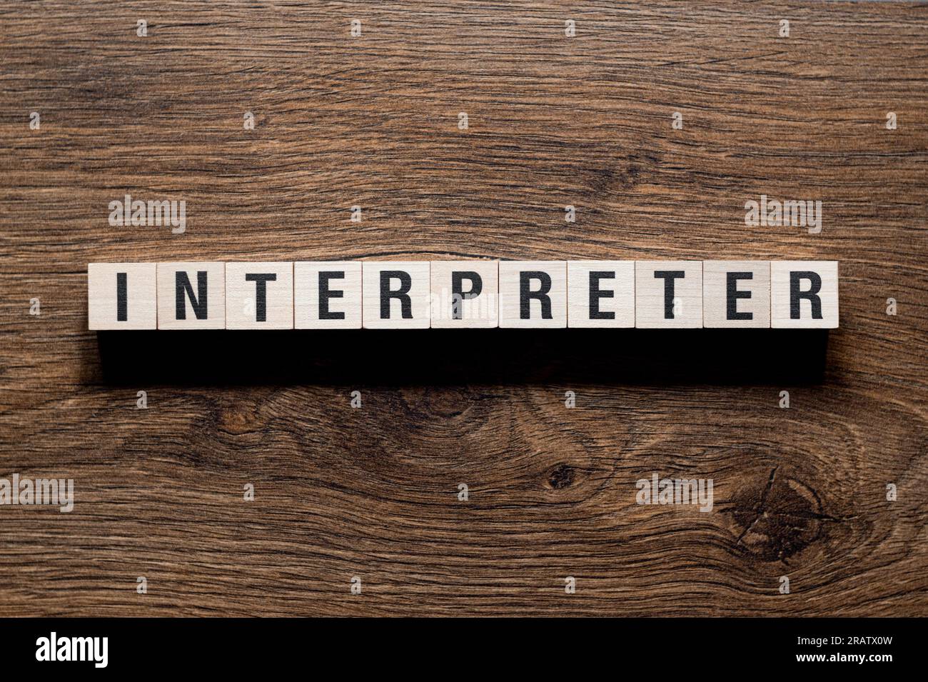 Interpreter - word concept on building blocks, text Stock Photo - Alamy