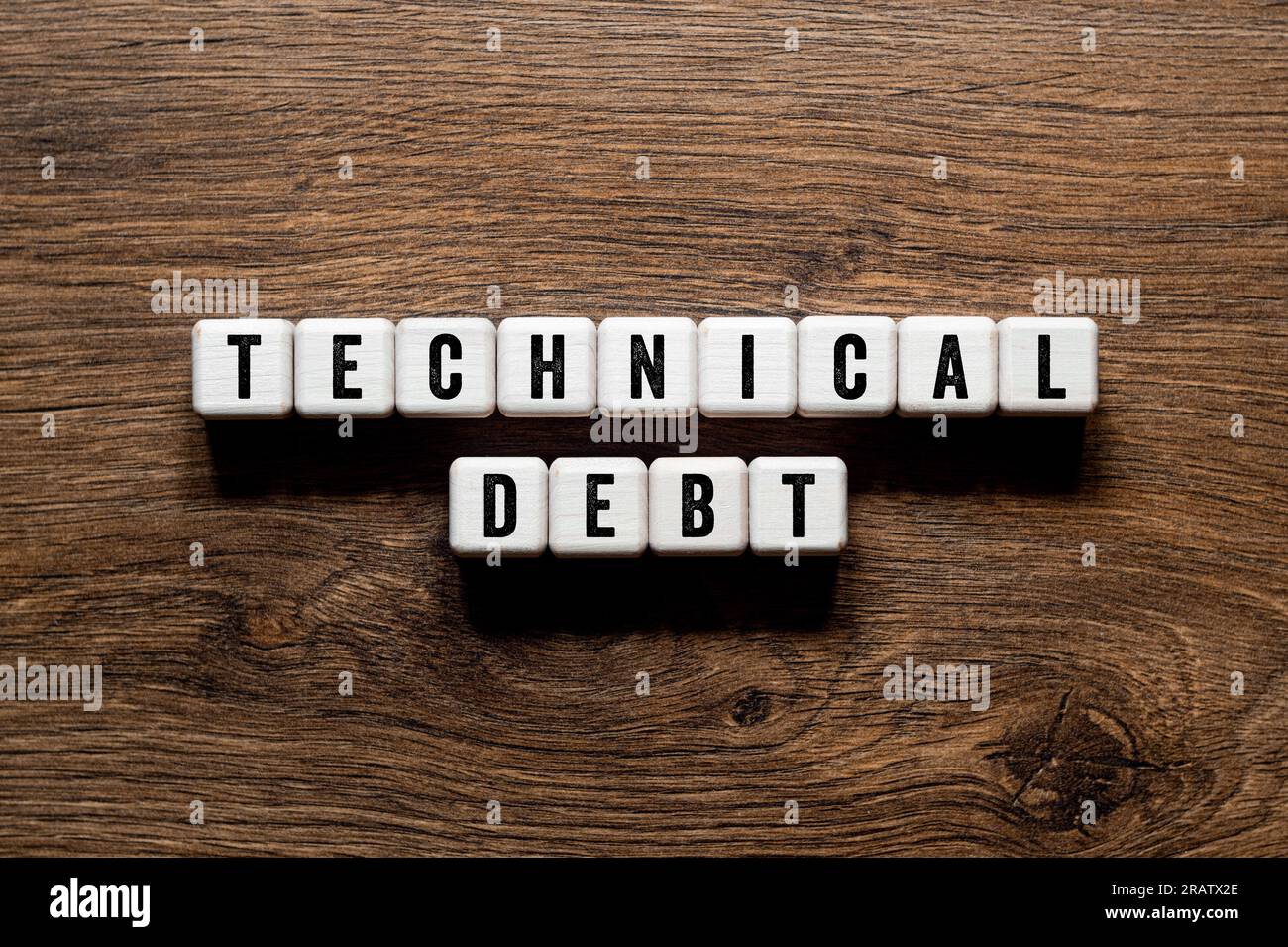 Technical debt - word concept on building blocks, text Stock Photo - Alamy