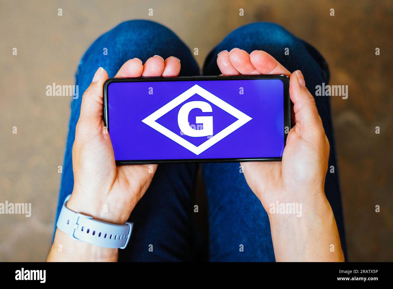 In this photo illustration, the Genco Shipping logo is displayed on a ...