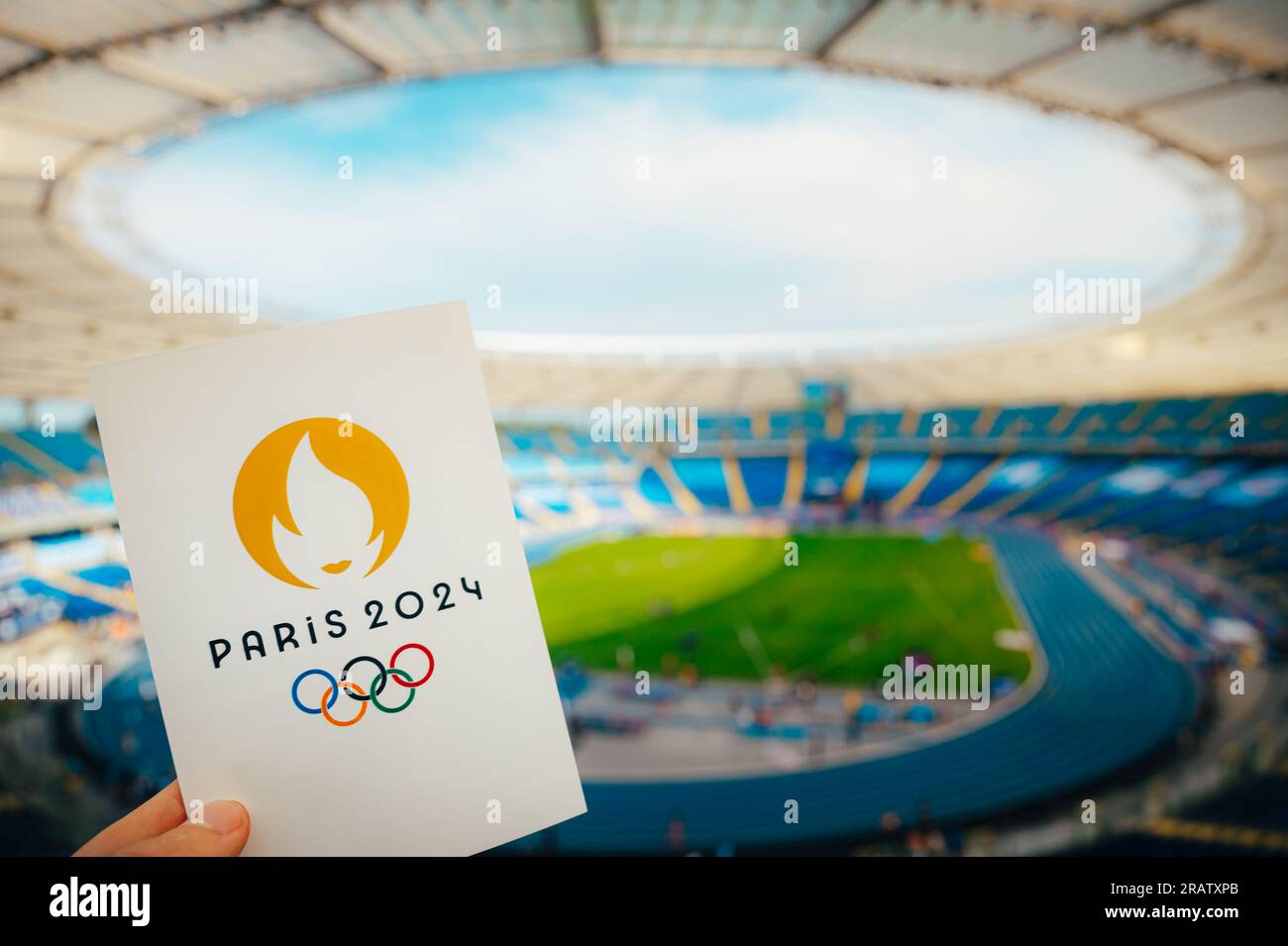PARIS, FRANCE, JULY 7, 2023: Embracing the Symbol: Athlete Holds Iconic ...