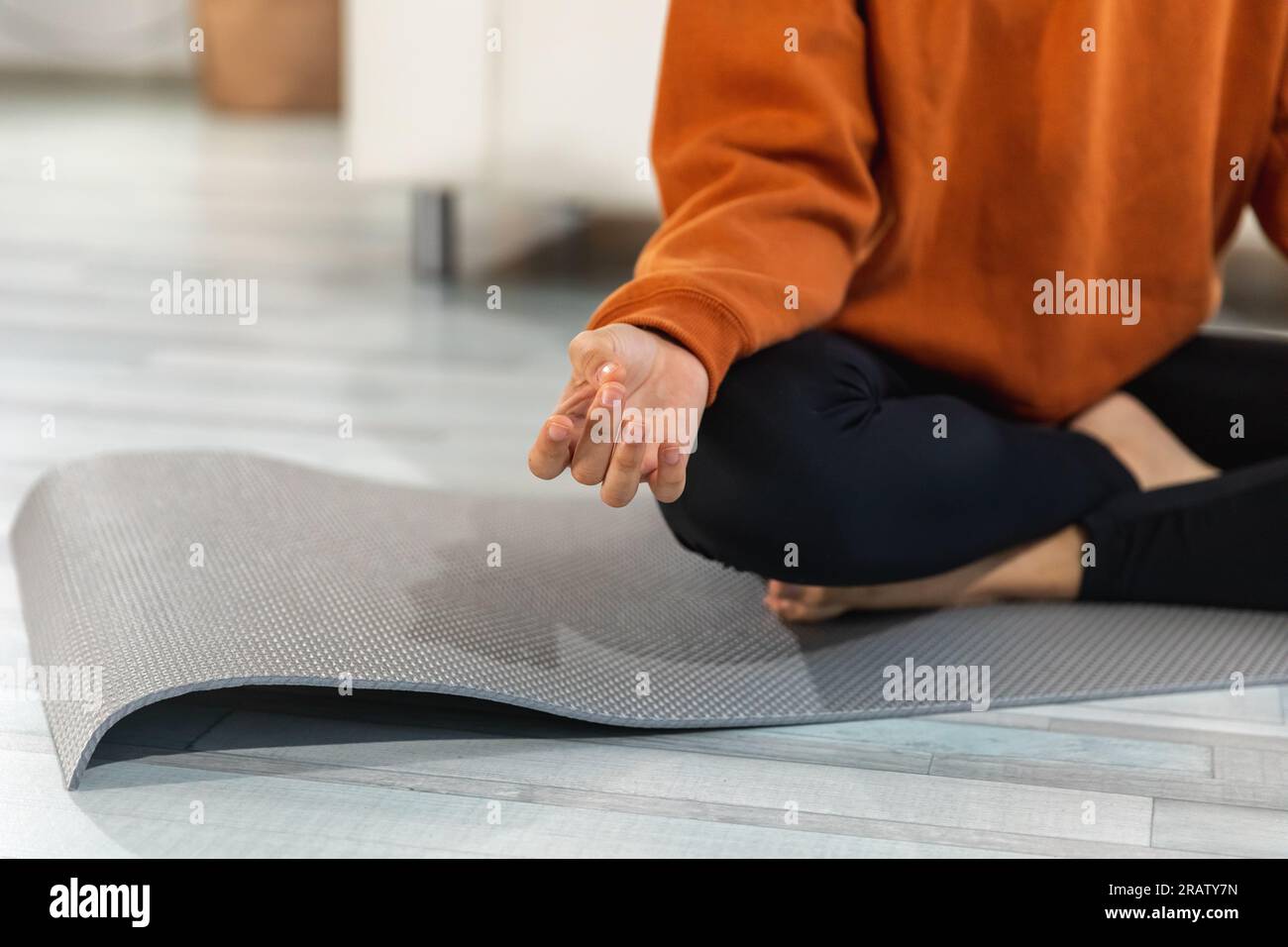 Yoga mindfulness meditation. Woman hands in chin mudra gesture. African ...