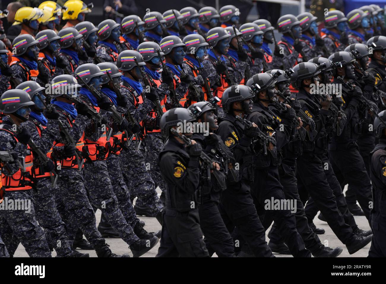 Soldiers march in an Independence Day military parade, in Caracas ...