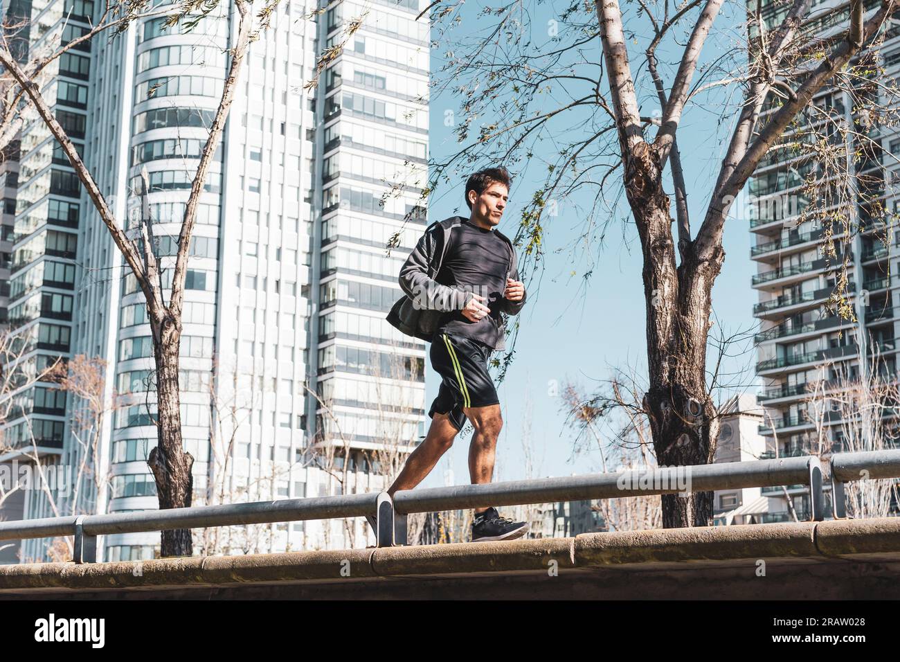 Side view motivated young hi-res stock photography and images - Alamy