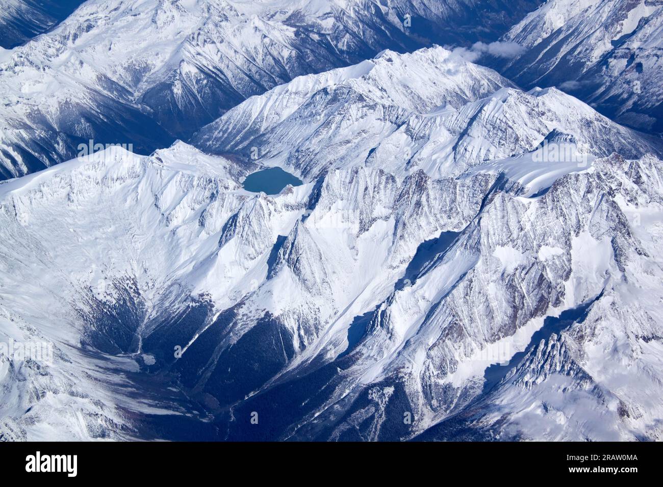 Sunny mountain ridges and glacial water Stock Photo - Alamy