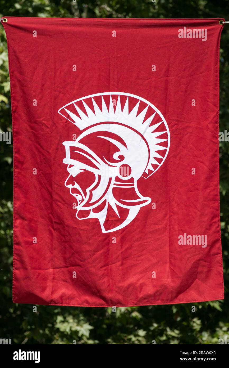 red banner in vertical view with the head of a roman legions soldier ...