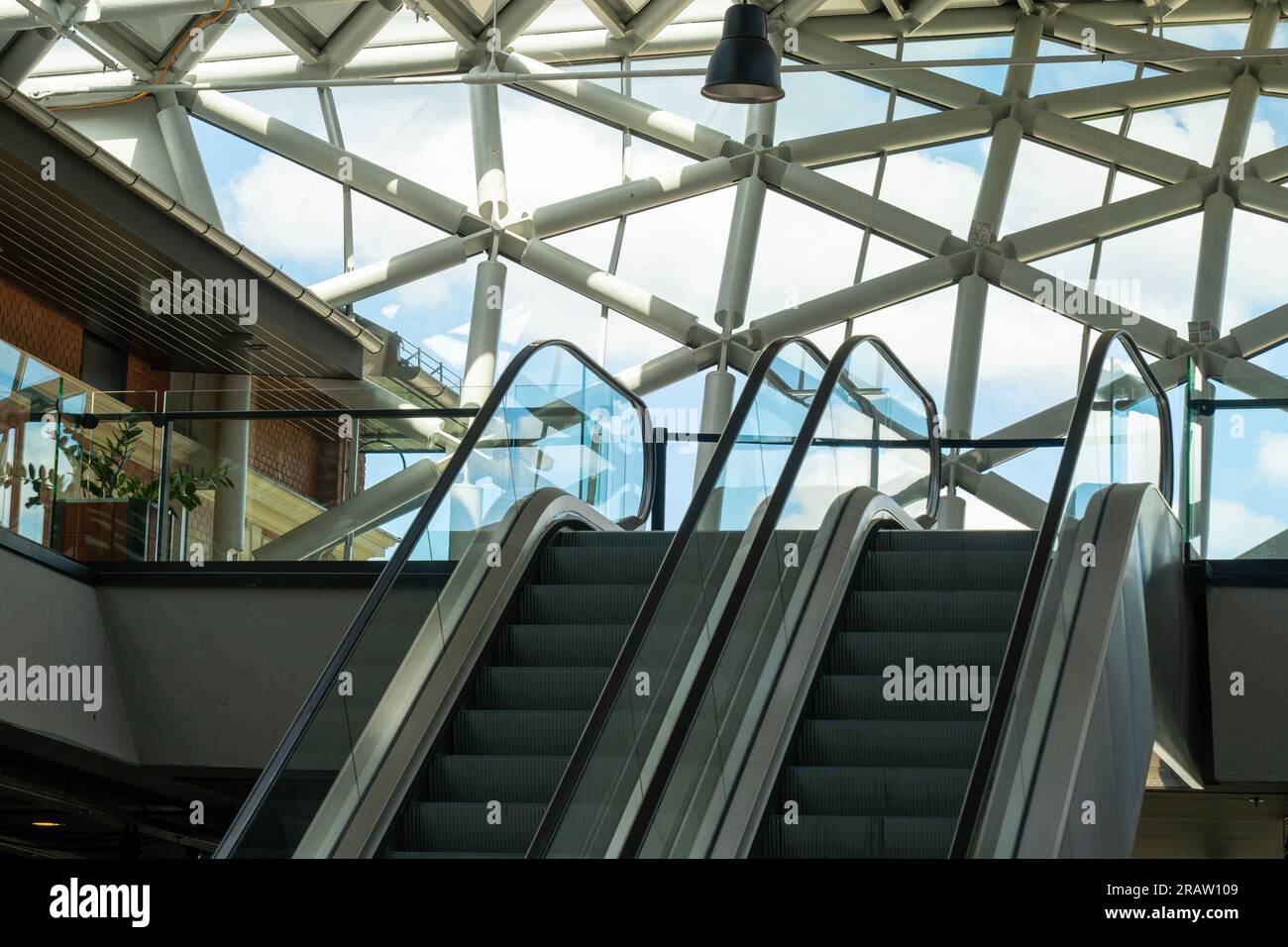 Modern building exterior with metal architectural triangle patterns ...